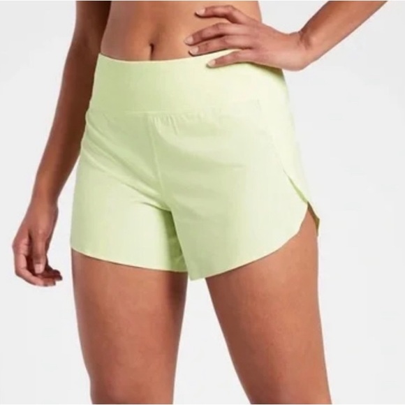 Athleta | Shorts | Athleta Run With It 35 Short Color Green Yellow ...